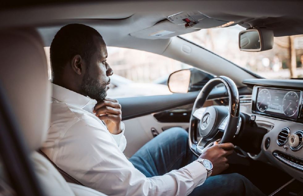 man thinking about rent while driving | Reckon Talk